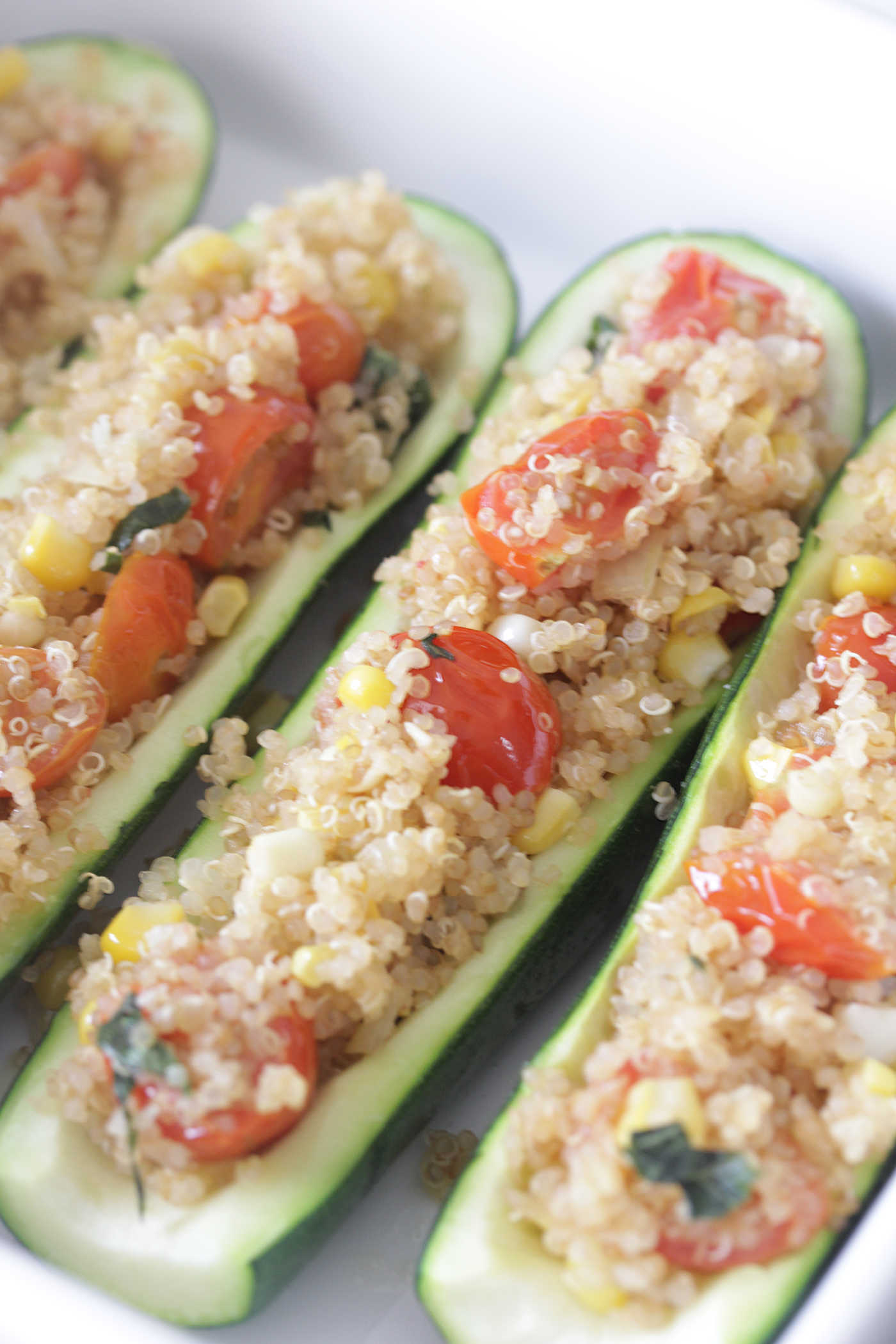 Corn and Tomato Stuffed Zucchini Boats - Eat. Drink. Love.